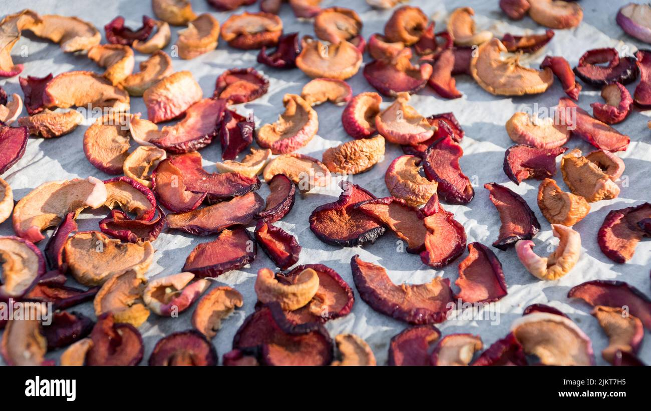 Sun dried apple slices. Raw organic dried apple fruit slices high angle ...