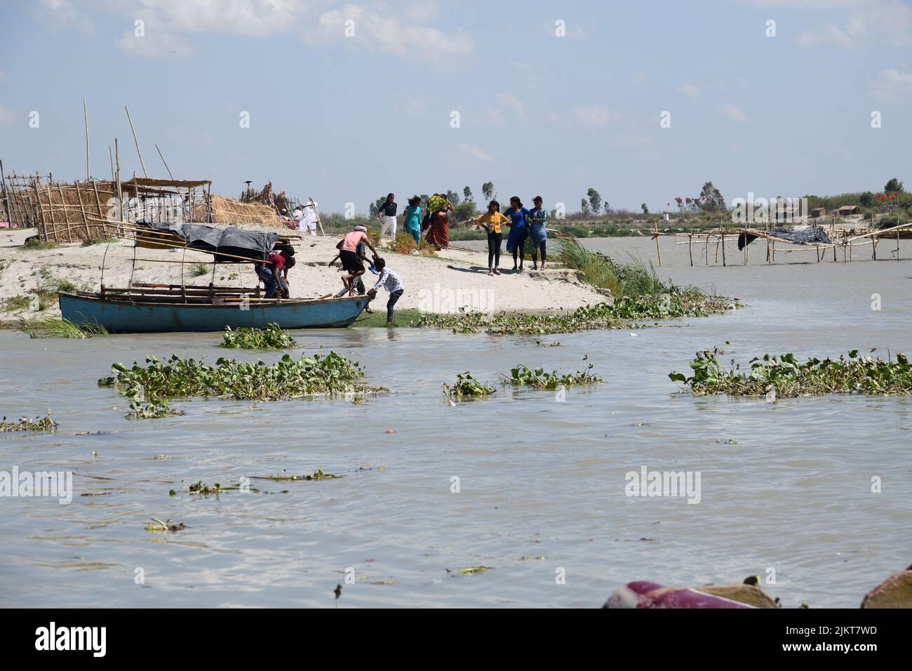 Daily life in the Ganges at Sarsaiya Ghat in monsoon. Kanpur, Uttar ...