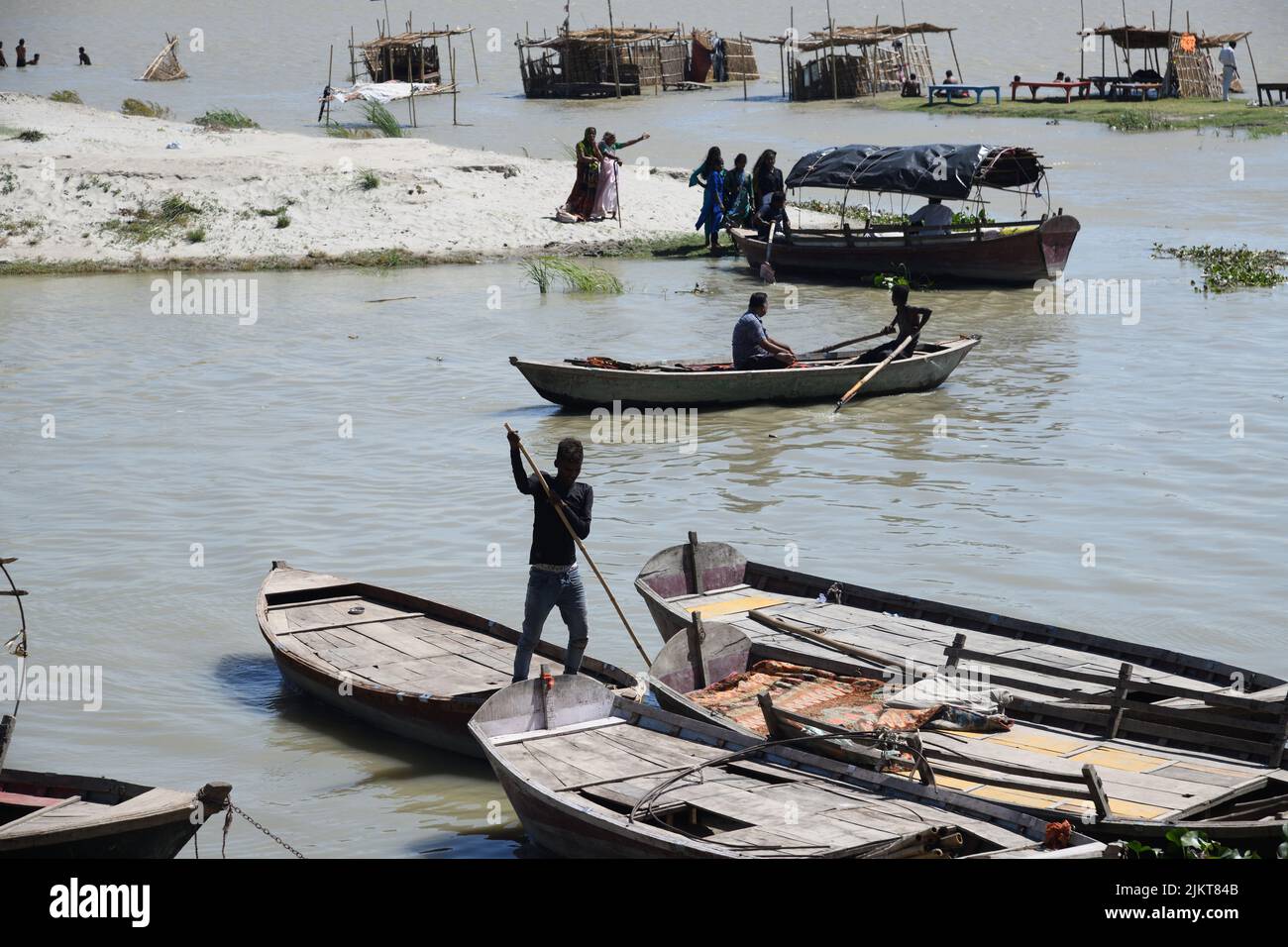 Daily life in the Ganges at Sarsaiya Ghat in monsoon. Kanpur, Uttar ...