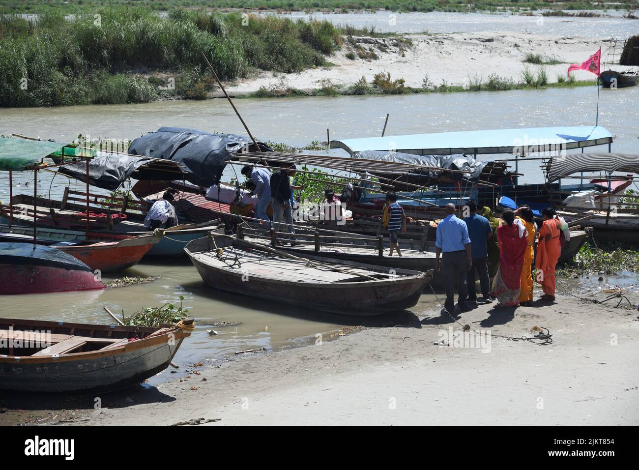Daily life in the Ganges at Sarsaiya Ghat in monsoon. Kanpur, Uttar ...