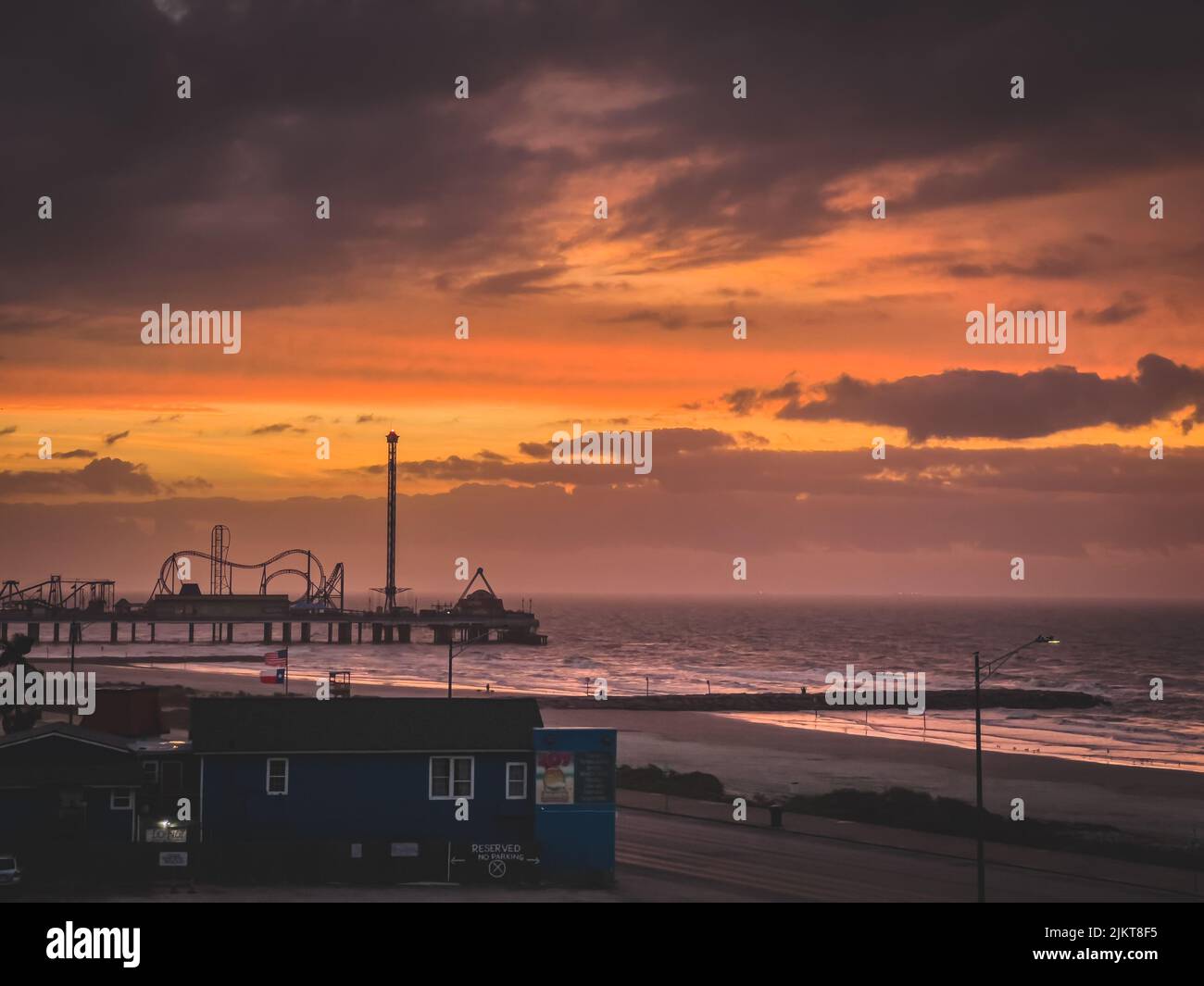 The beautiful sunset view of Pleasure Pier in Galveston, Texas Stock ...