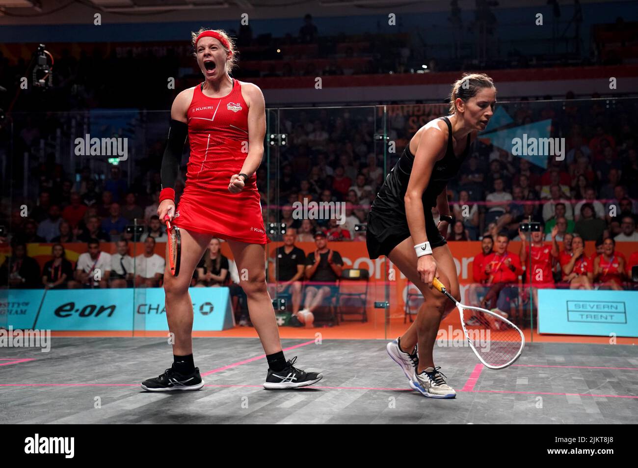 England's Sarah-Jane Perry (left) celebrates winning a point on her way ...