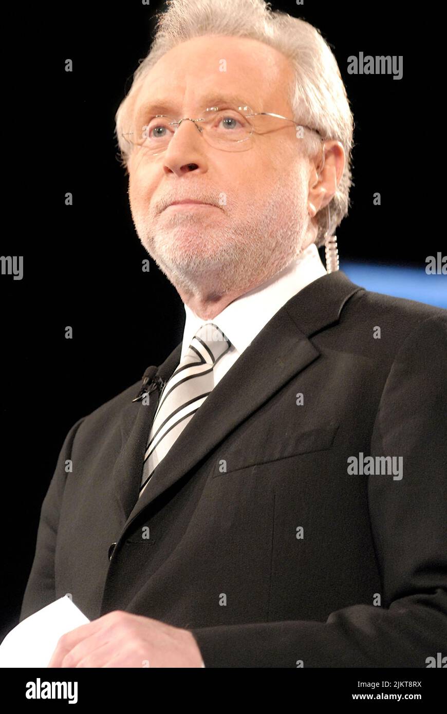 A vertical shot of the CNN news anchor Wolf Blitzer appearing live ...