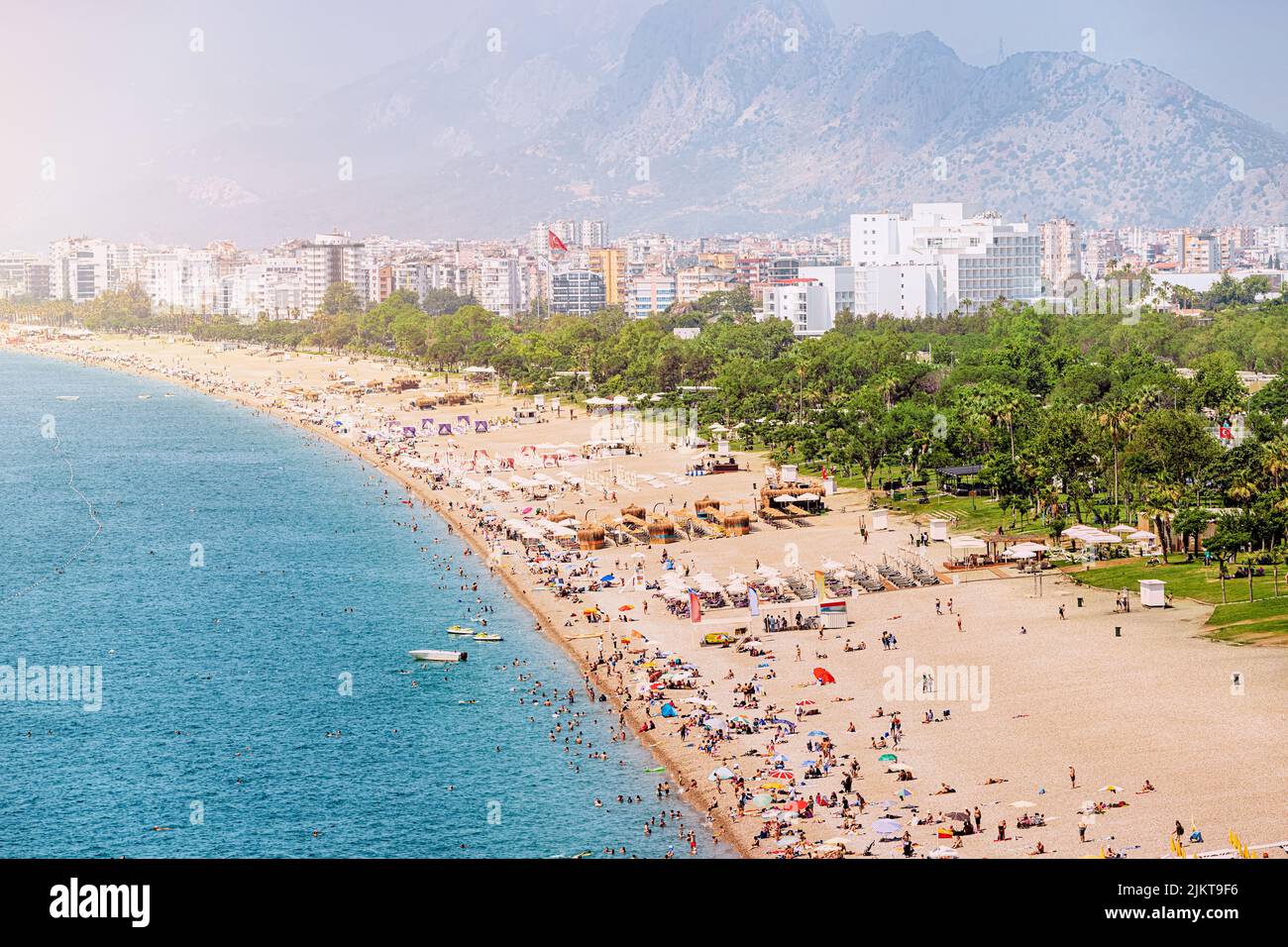 Crowded Antalya city Konyaalti beach with hundreds of vacationers and ...