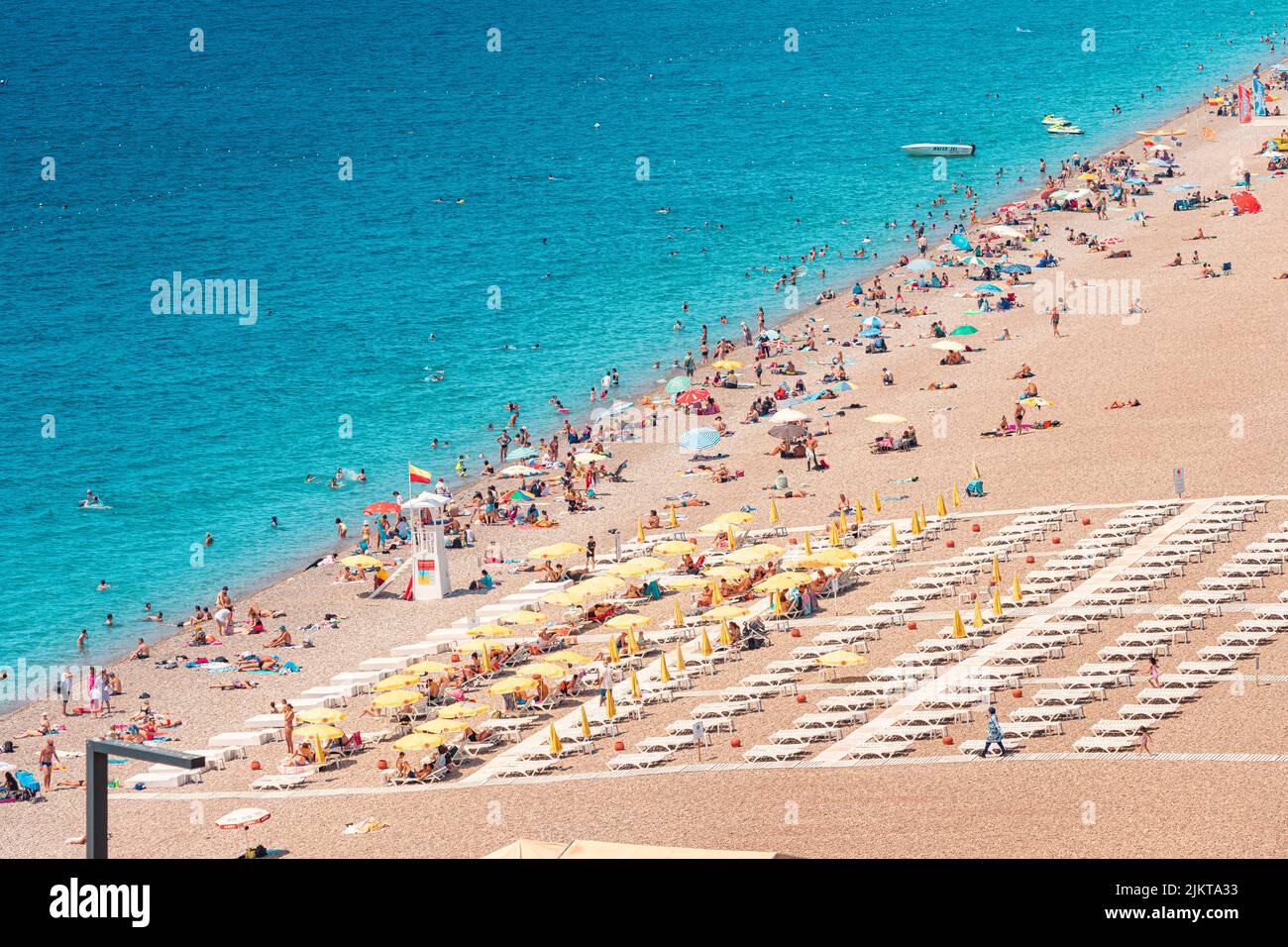 04 June 2022, Antalya, Turkey: Crowded city beach with hundreds of ...