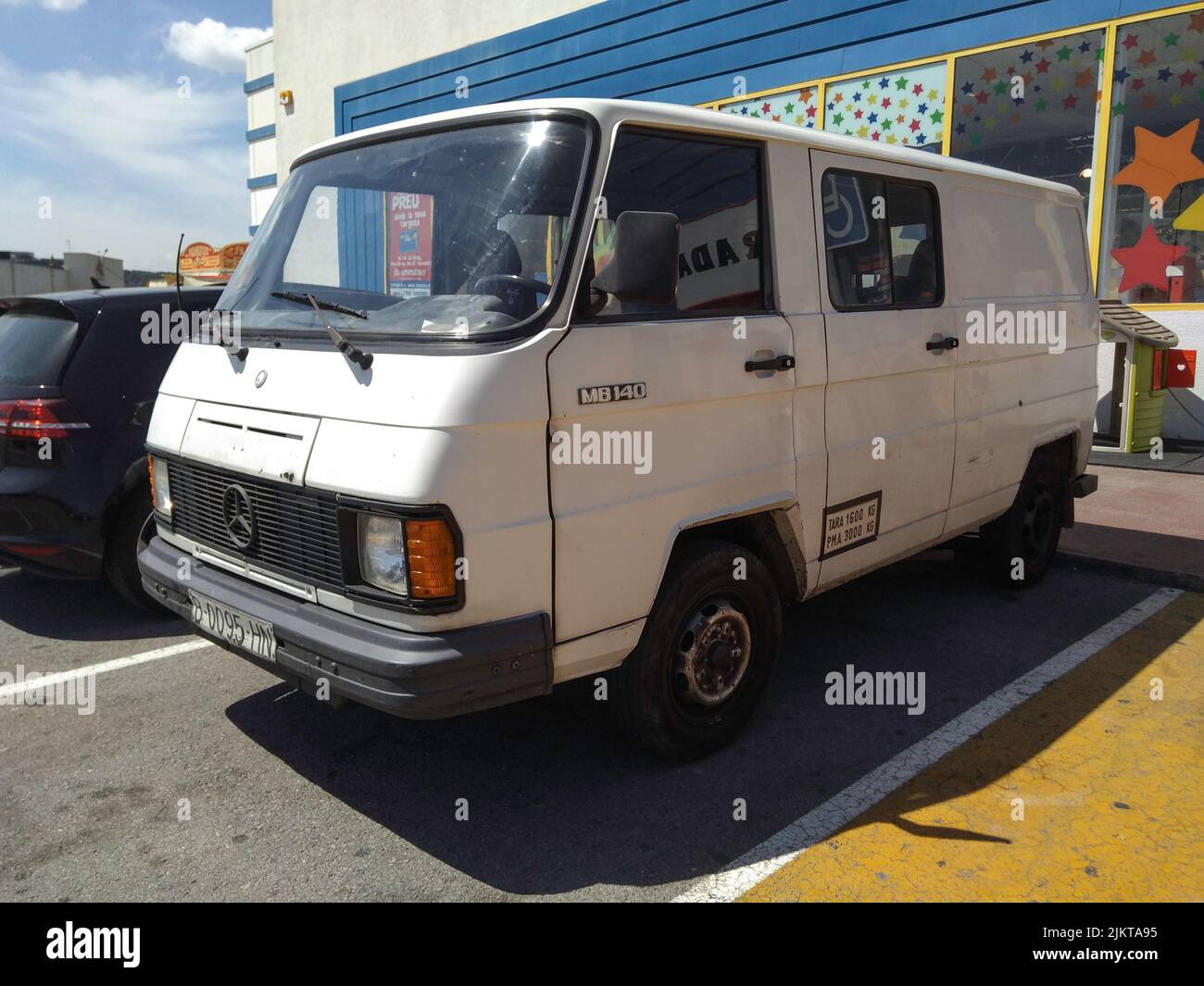 Old white van parked in the street, classic Mercedes Benz MB140 Stock ...