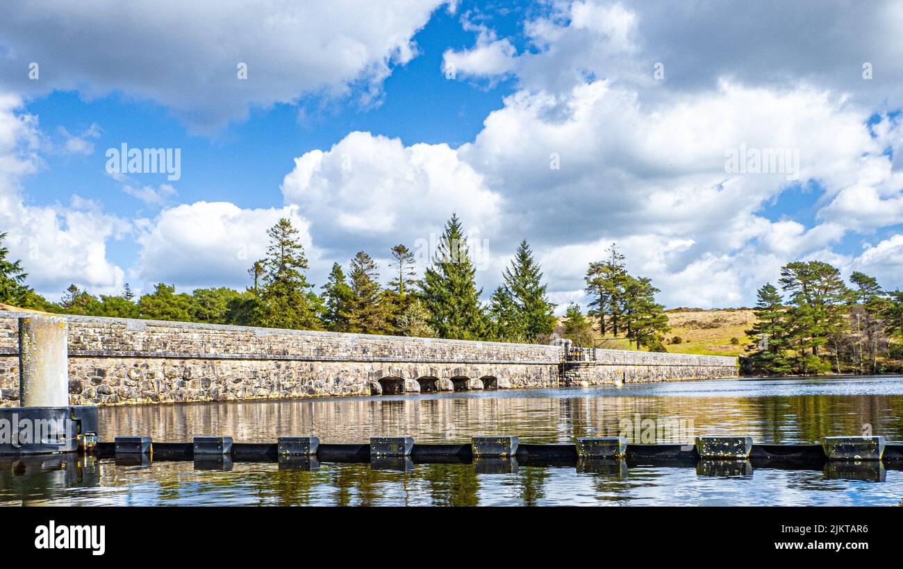 A photo of a stone bridge over a river Stock Photo - Alamy