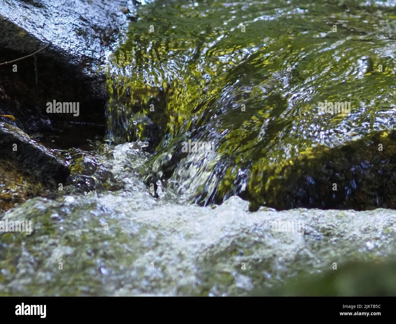 Water flowing down a mountain hi-res stock photography and images - Alamy