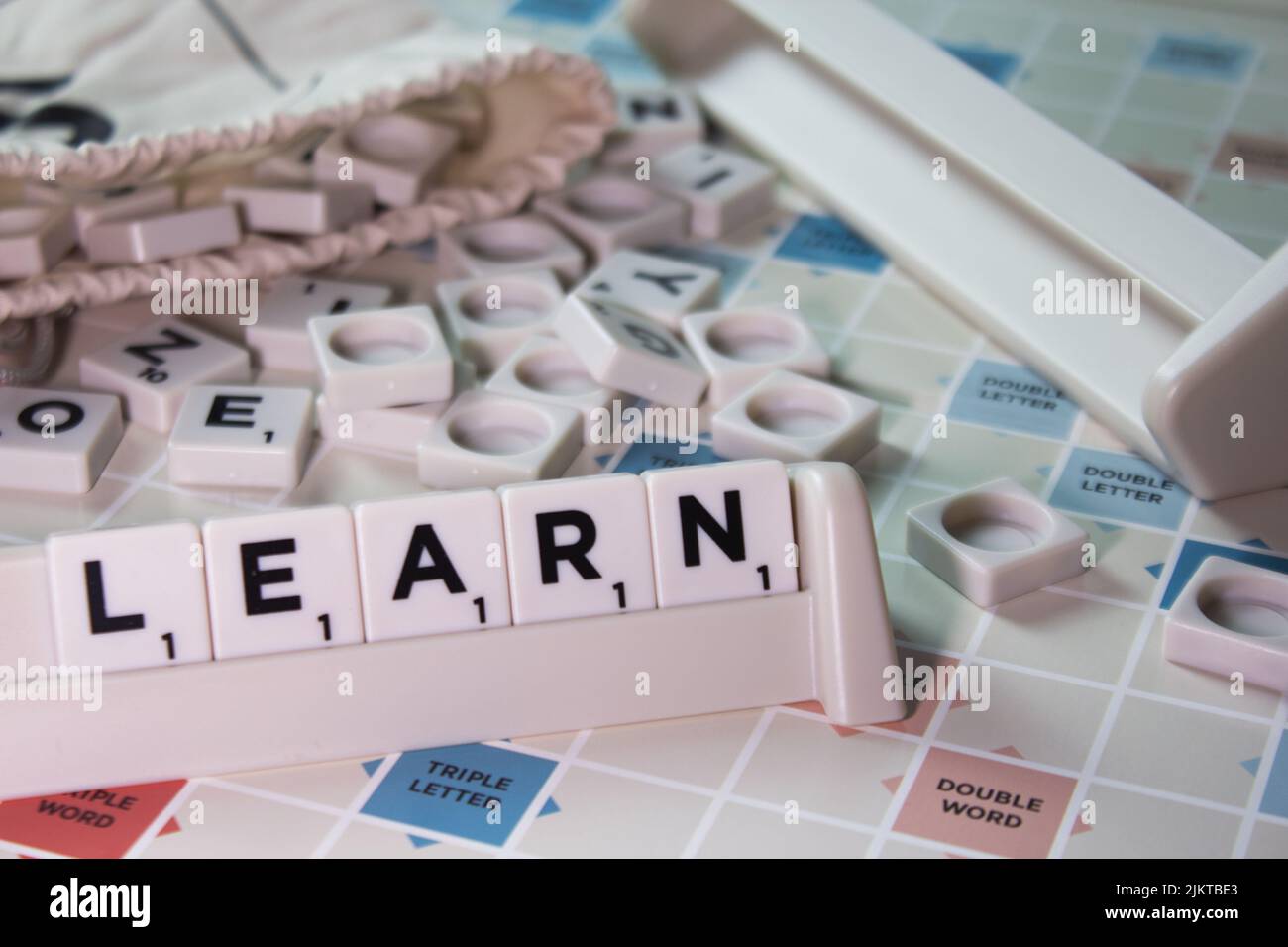 A closeup of the word learn spelled on white cube shapes Stock Photo ...