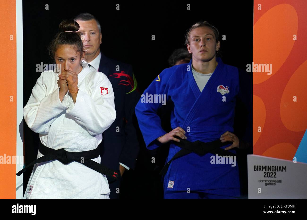 Wales’ Natalie Powell (white) and England’s Emma Reid look on ahead of ...