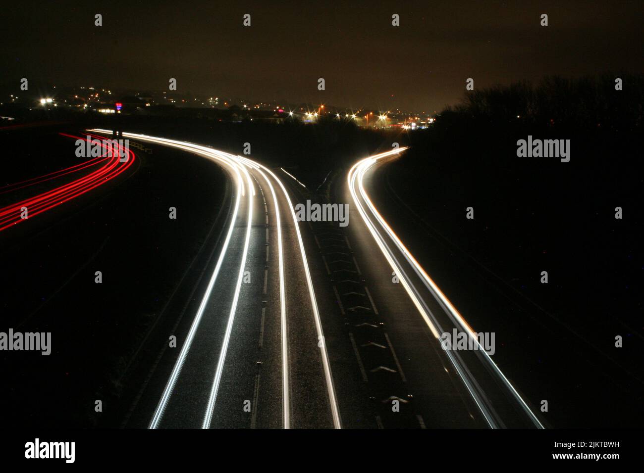 A beautiful dark view of a traffic road with long exposure lights Stock ...