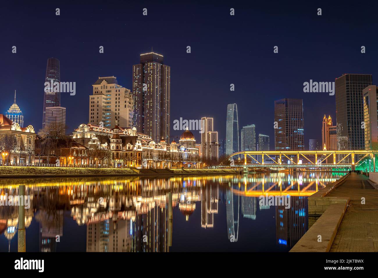 City scape with modern buildings and towers with a river in a city by ...