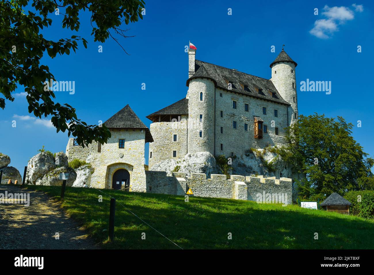 The Bobolice Castle during evening in the village of Bobolice, Poland ...