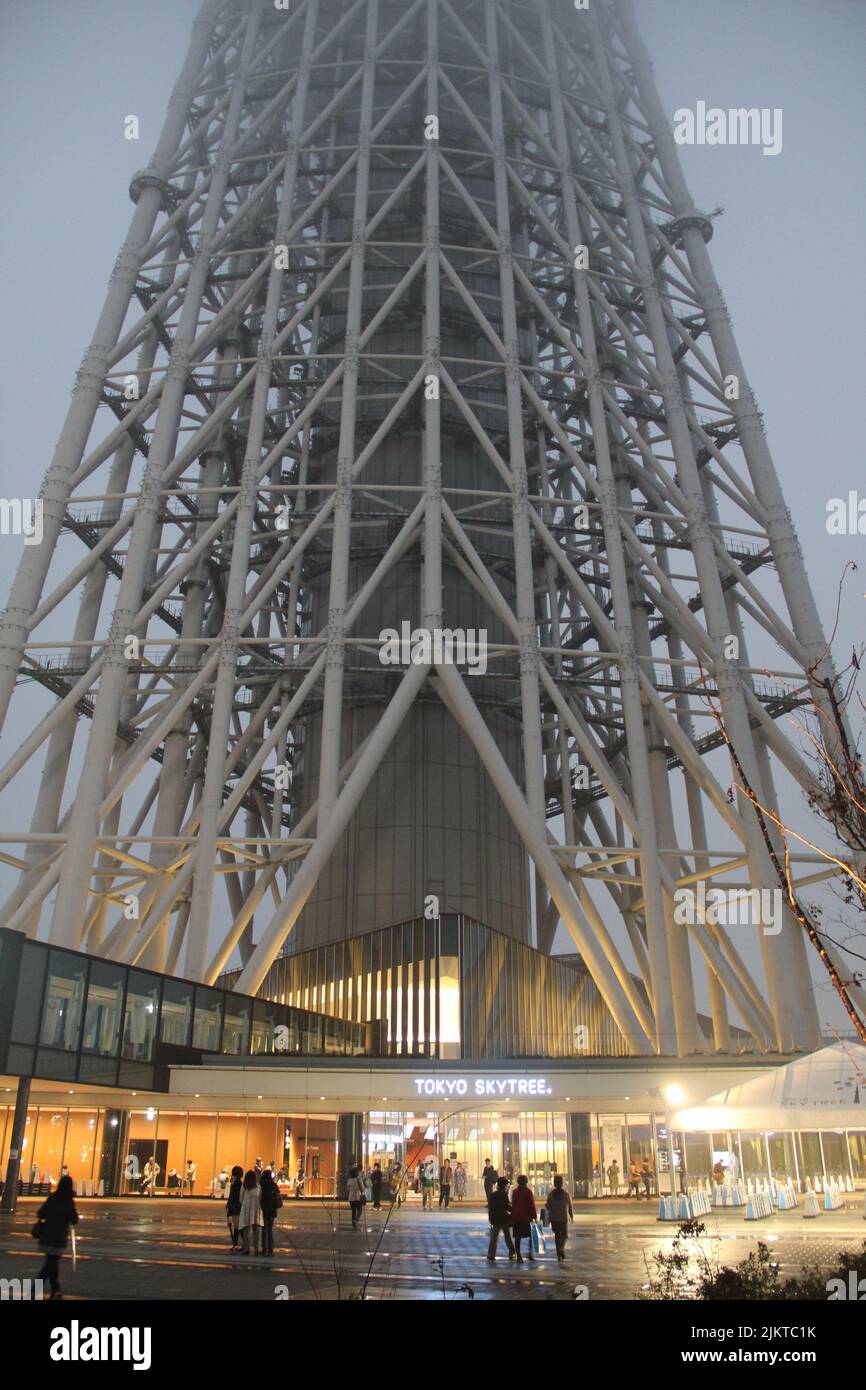 Tokyo Skytree at a misty and rainy night in Tokyo Japan. The entrance ...