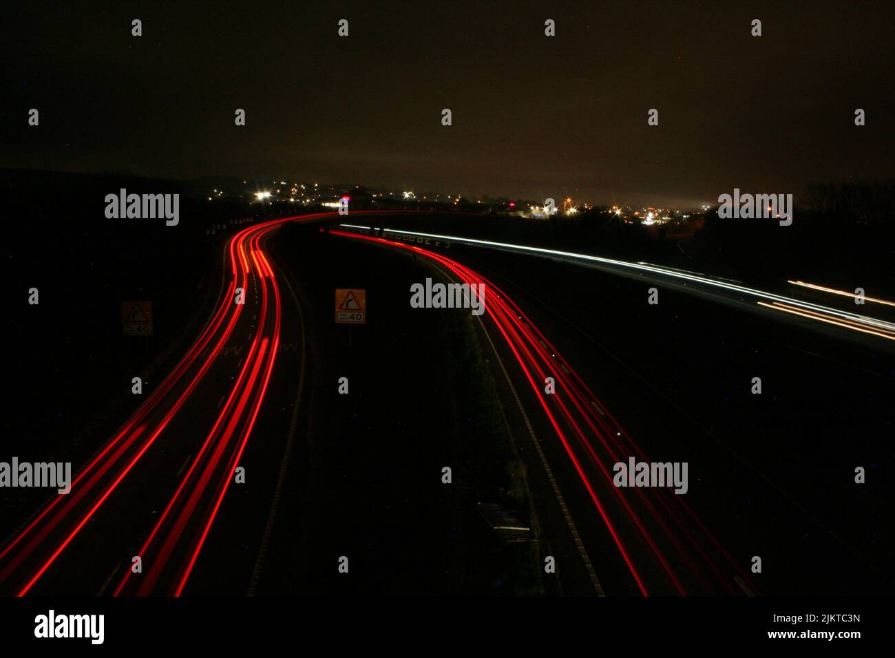 A beautiful dark view of a traffic road with long exposure lights Stock ...