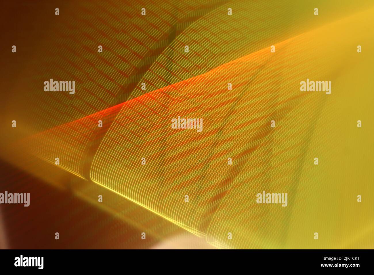 An abstract light streaks on a yellow surface Stock Photo - Alamy