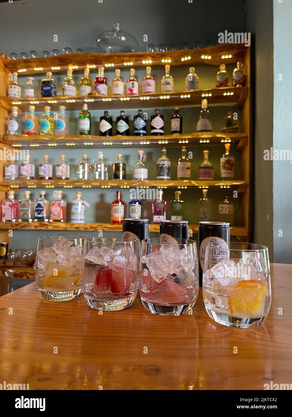 Gin tasting in a variety of flavours Stock Photo - Alamy