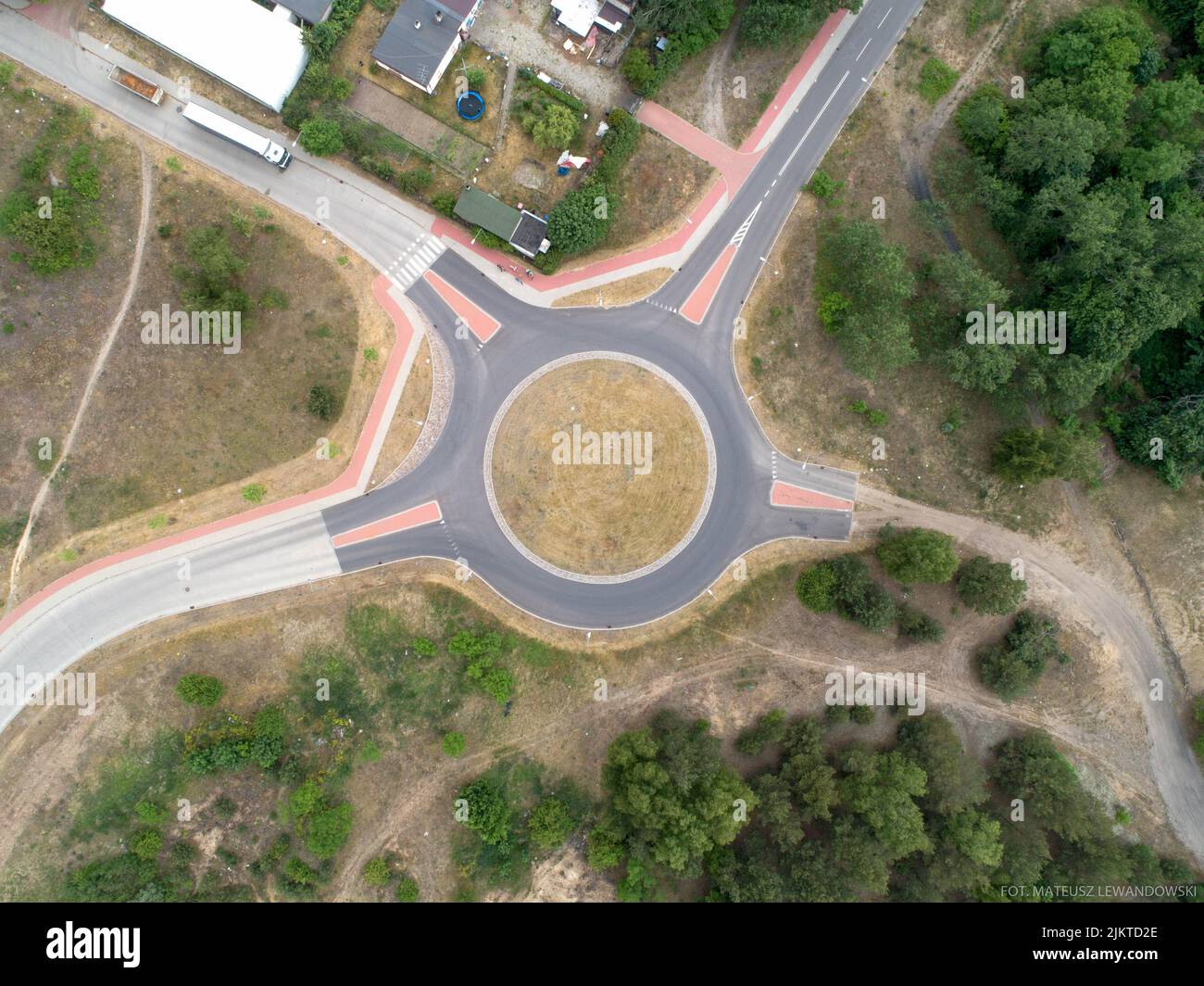 An aerial view of road traffic roundabout in urban area Stock Photo - Alamy