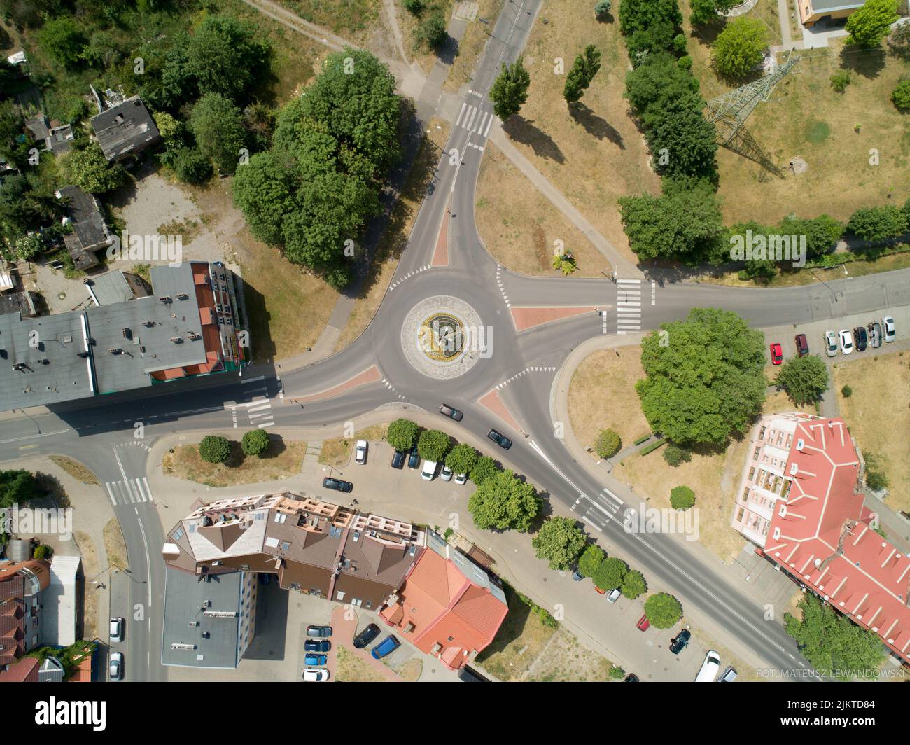 An aerial view of road traffic roundabout in urban area Stock Photo - Alamy