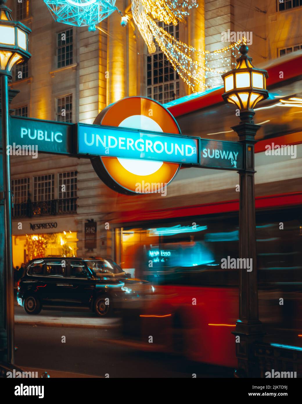 A vertical shot of cars in motion against the historic buildings of ...