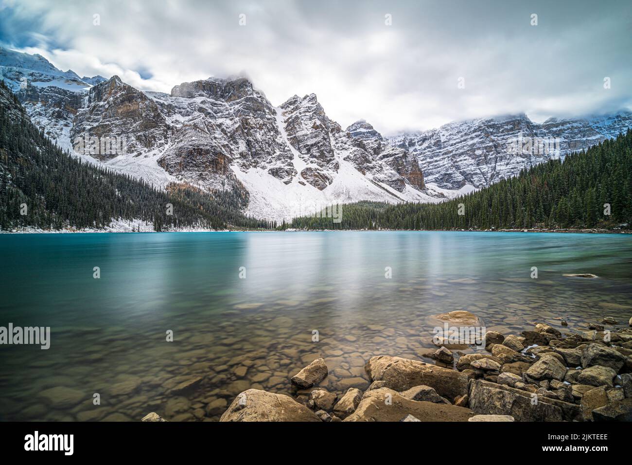 The beautiful winter landscape with the lake and mountains. Canadian ...