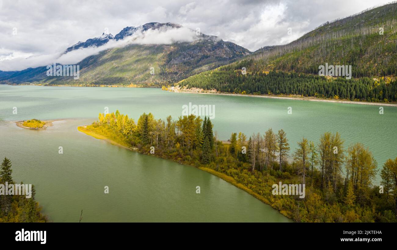 The beautiful autumn landscape with the lake and mountains. Canadian ...