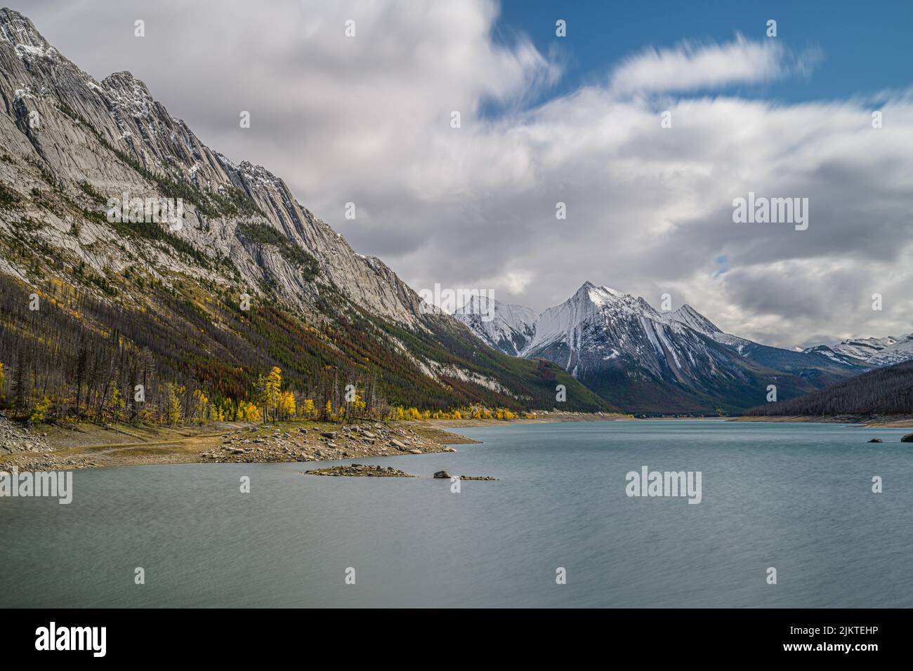 The beautiful autumn landscape with the lake and mountains. Canadian ...