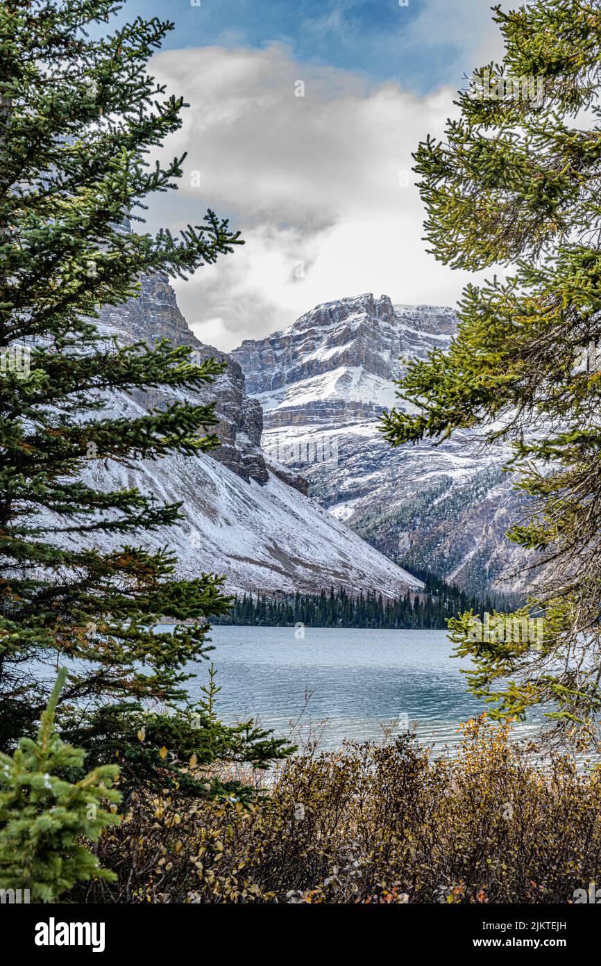 A vertical shot of the landscape with a lake and mountains. Canadian ...