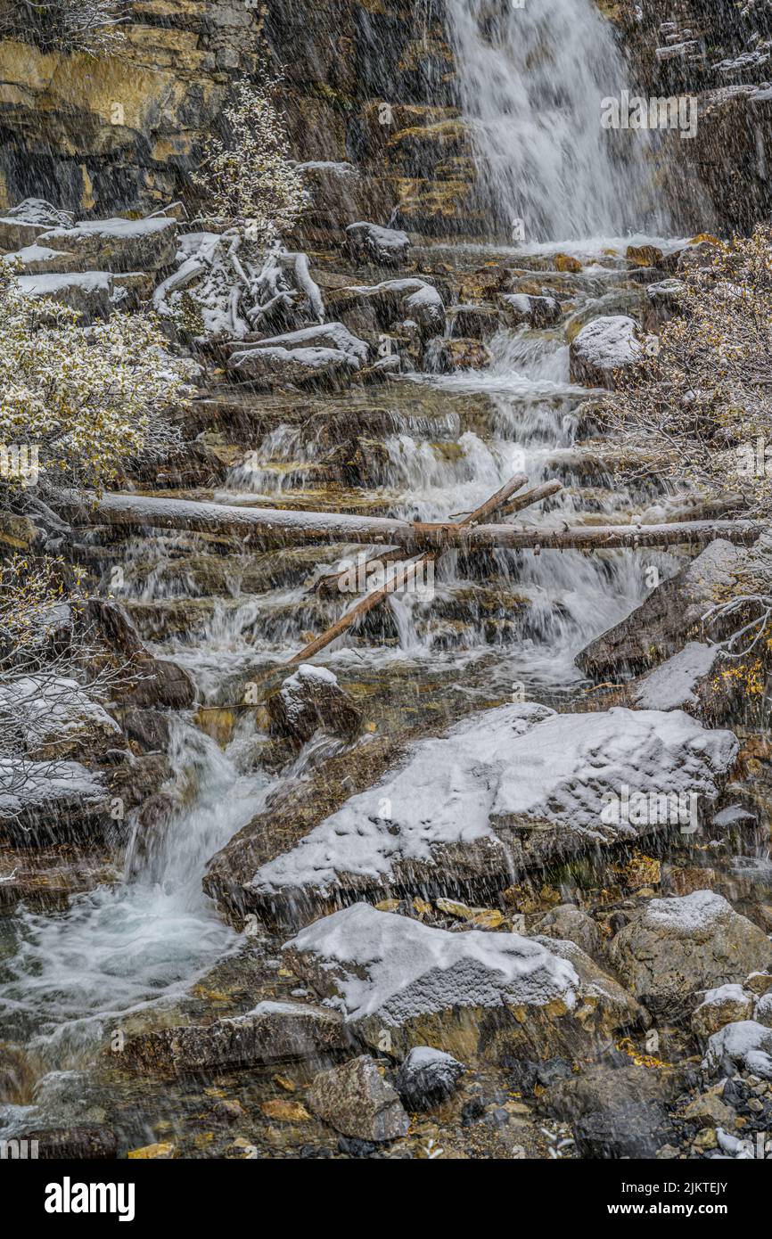 A vertical closeup of the rocky waterfall. Canadian nature Stock Photo ...