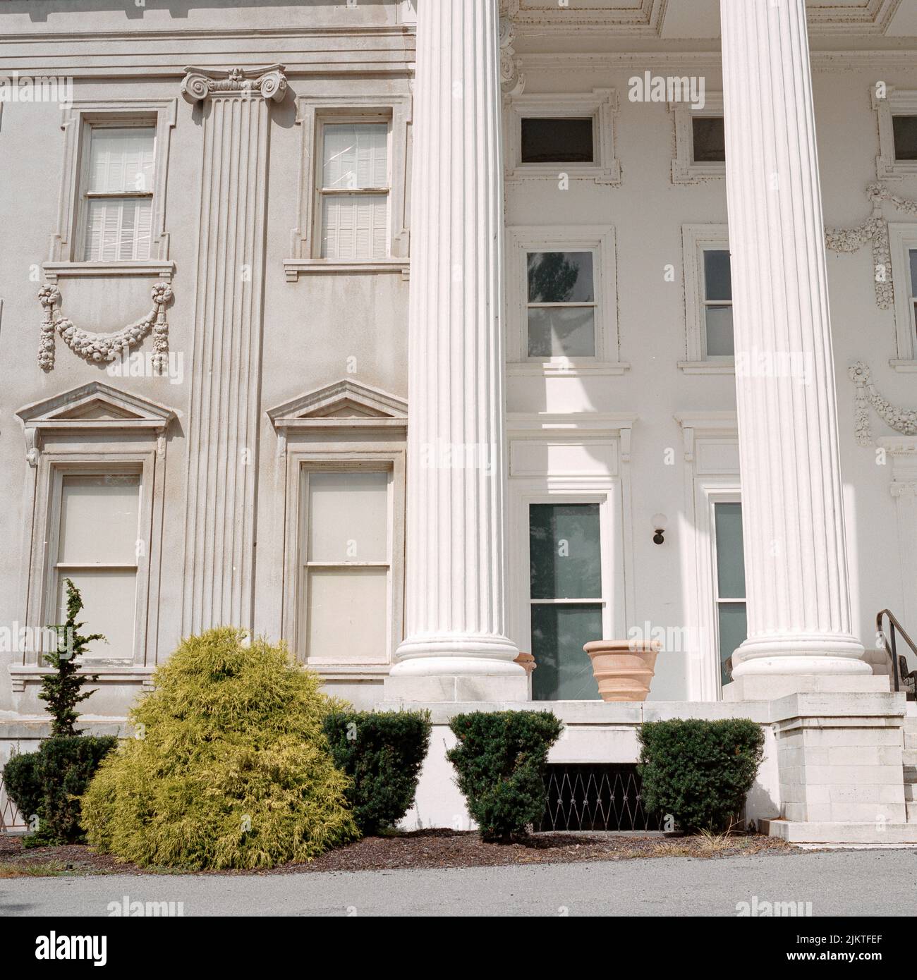An exterior of an old house with columns Stock Photo - Alamy