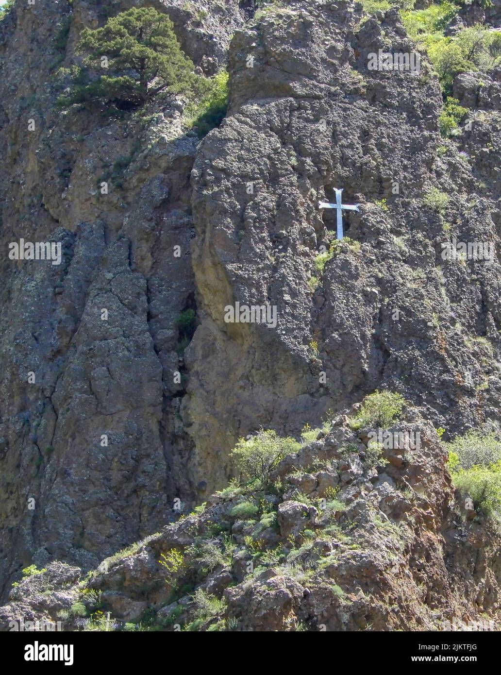 A white cross on the cliff near Geghard Monastery Stock Photo - Alamy