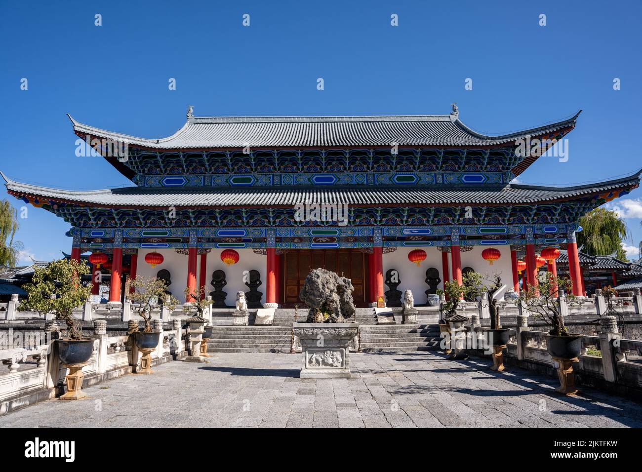 A view of Mufu palace entrance surrounded by plants in Lijian Stock ...