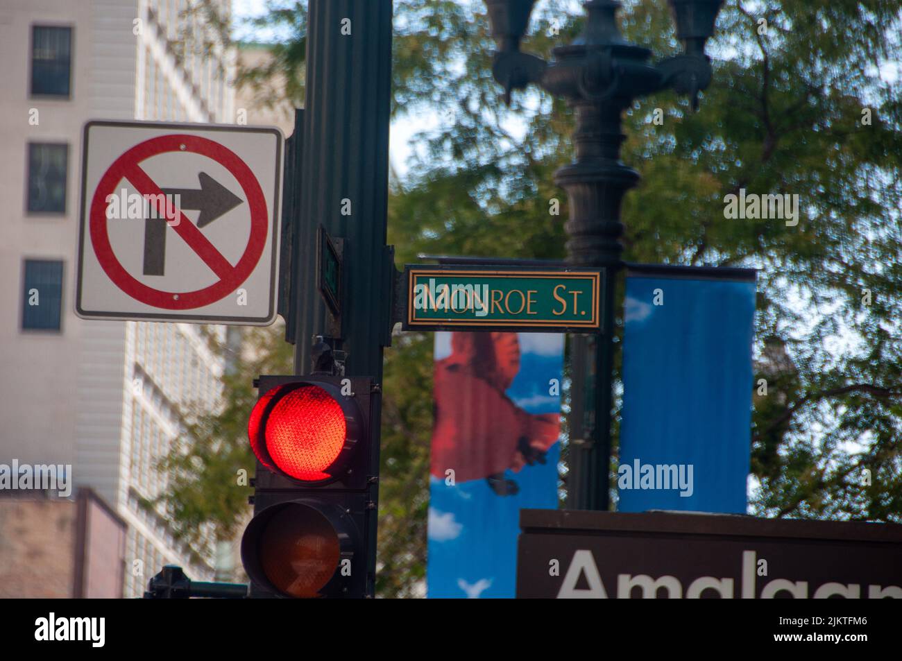 A metal roadsign showing the Monroe street in Madison, WI, USA in the ...