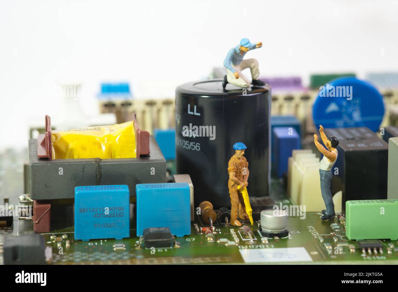 repairing an electronic circuit board by a worker team Stock Photo - Alamy