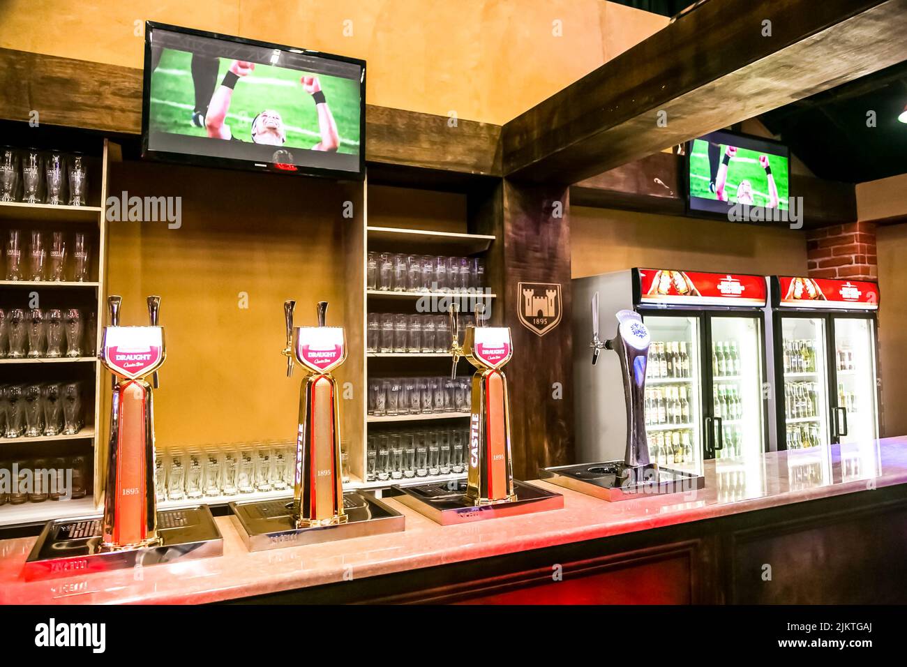 An interior of an Alcohol Bar and tavern with bottle coolers Stock ...