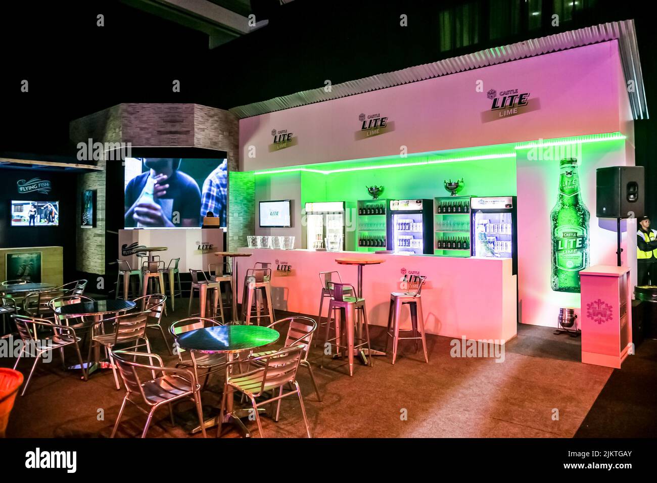 A beautiful interior of an Alcohol Bar and tavern with illuminated ...