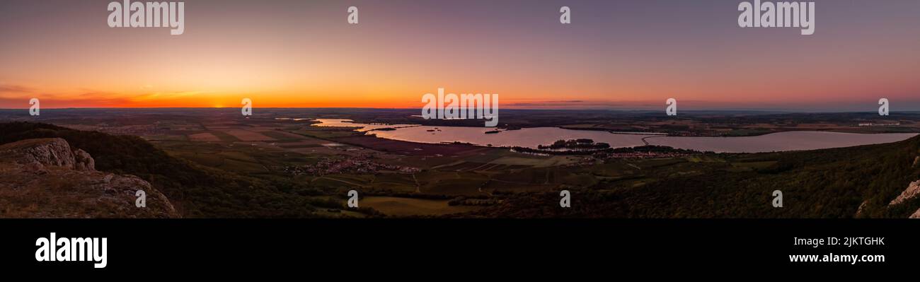 A panoramic view of a water reservoir with tiny islands in it ...