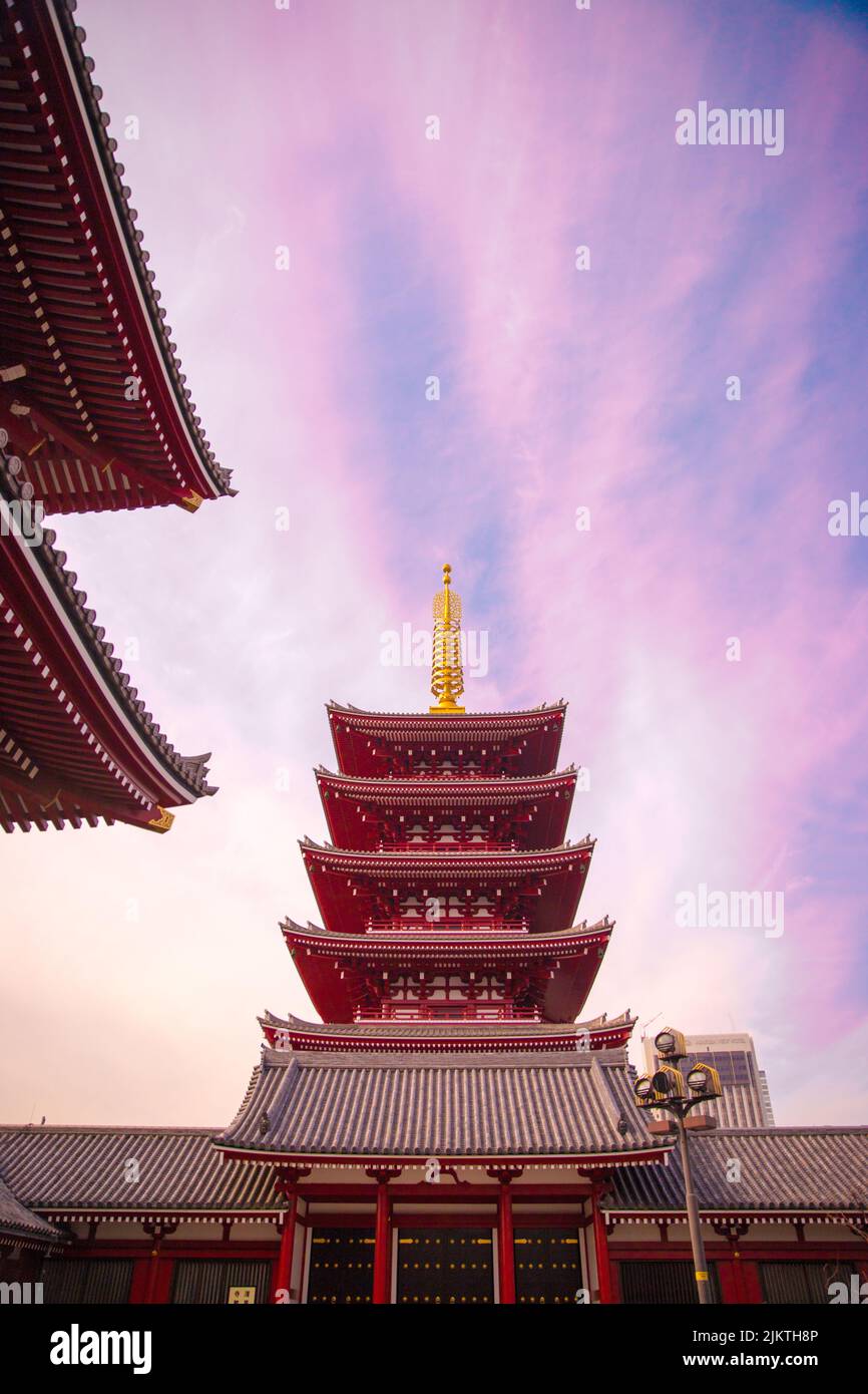 A vertical low angle shot of the Five-Story Pagoda of Senso-ji in Tokyo ...