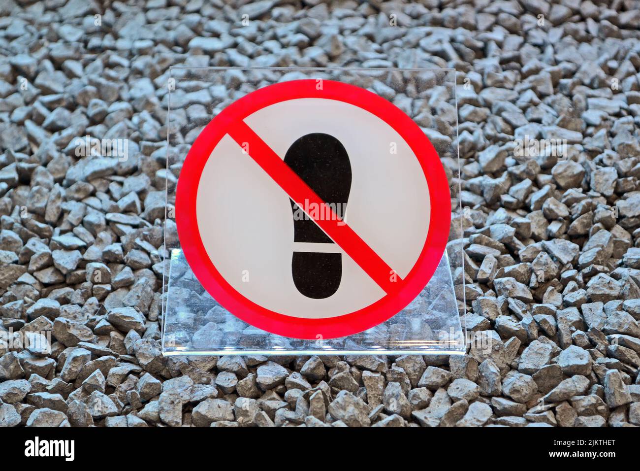 no footprints plastic sign on stone surface, modern security diversity ...