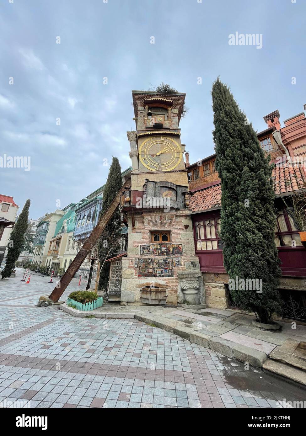 A vertical shot of the Tbilisi leaning clock tower in Tbilisi, Georgia ...