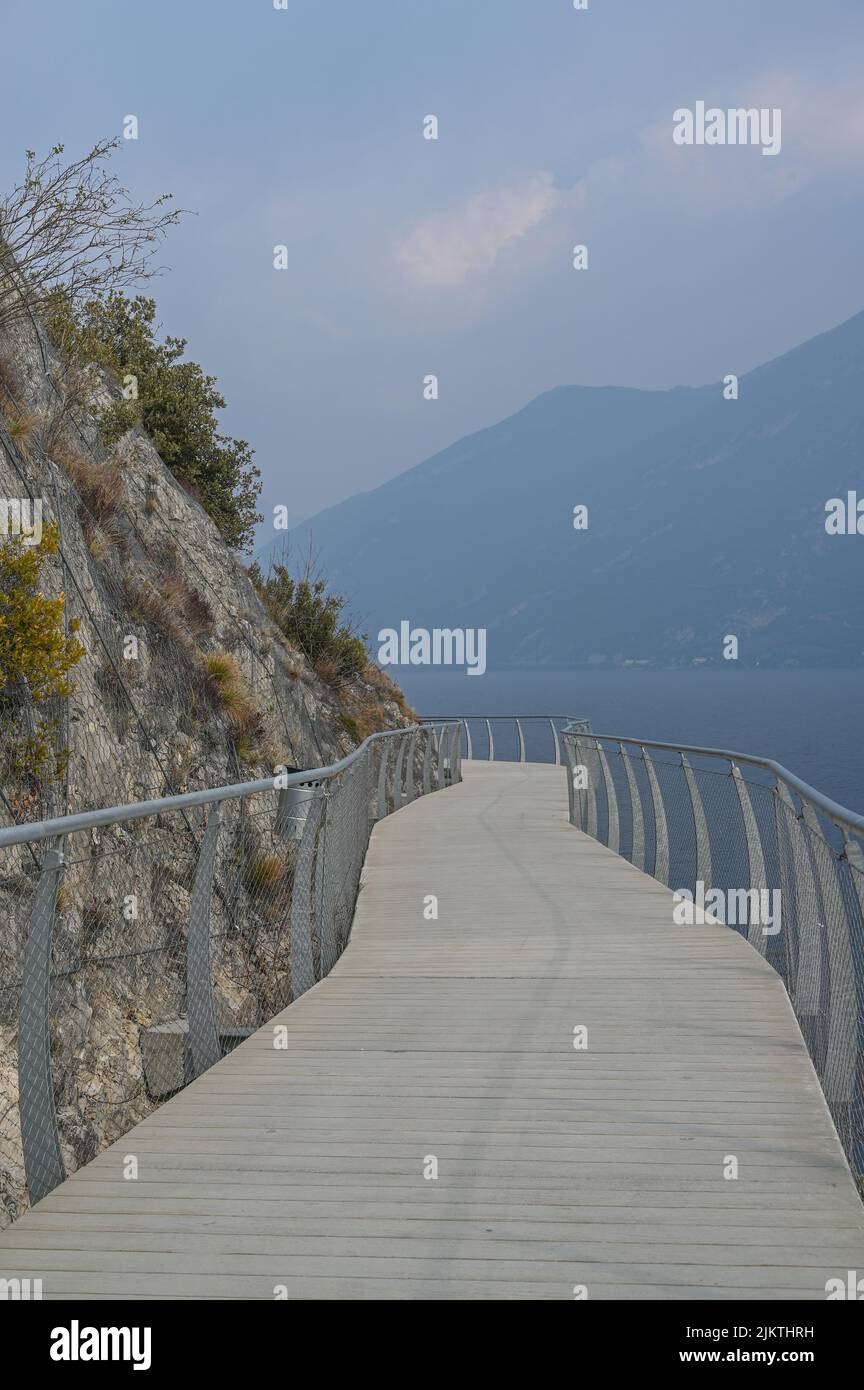 A beautiful view of a pathway with a mountain in the background Stock ...