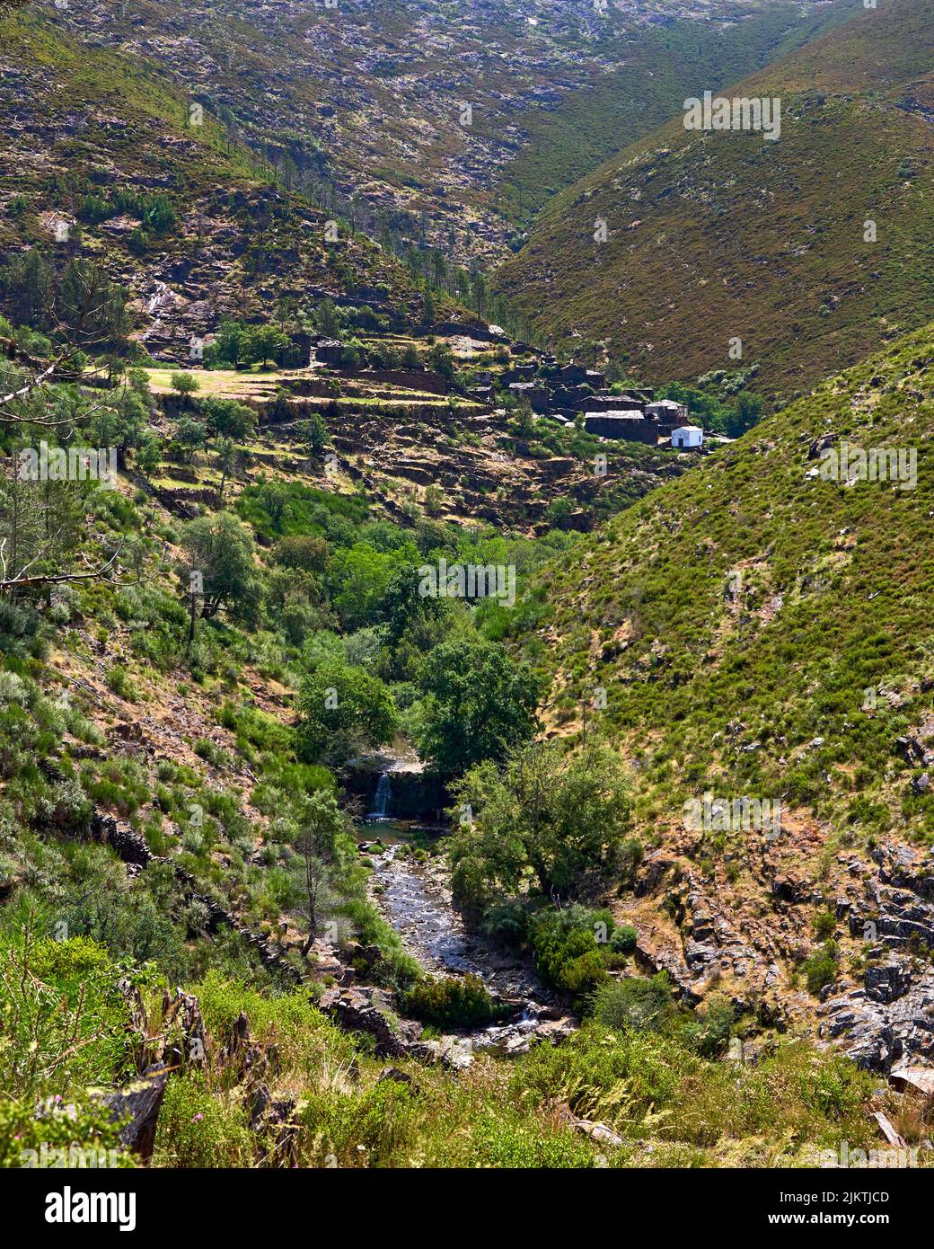An old village landscape surrounded with mountains and countryside ...