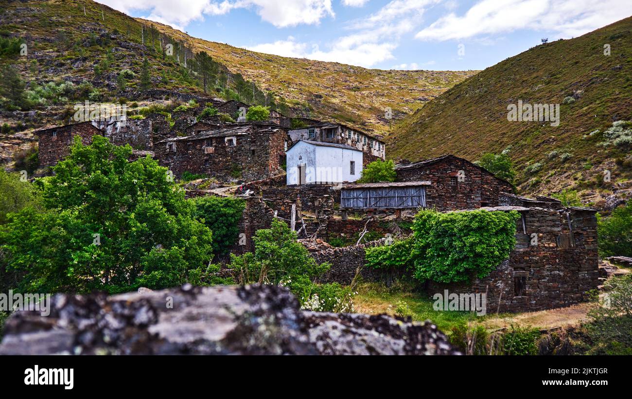 An old village landscape surrounded by mountains and countryside ...