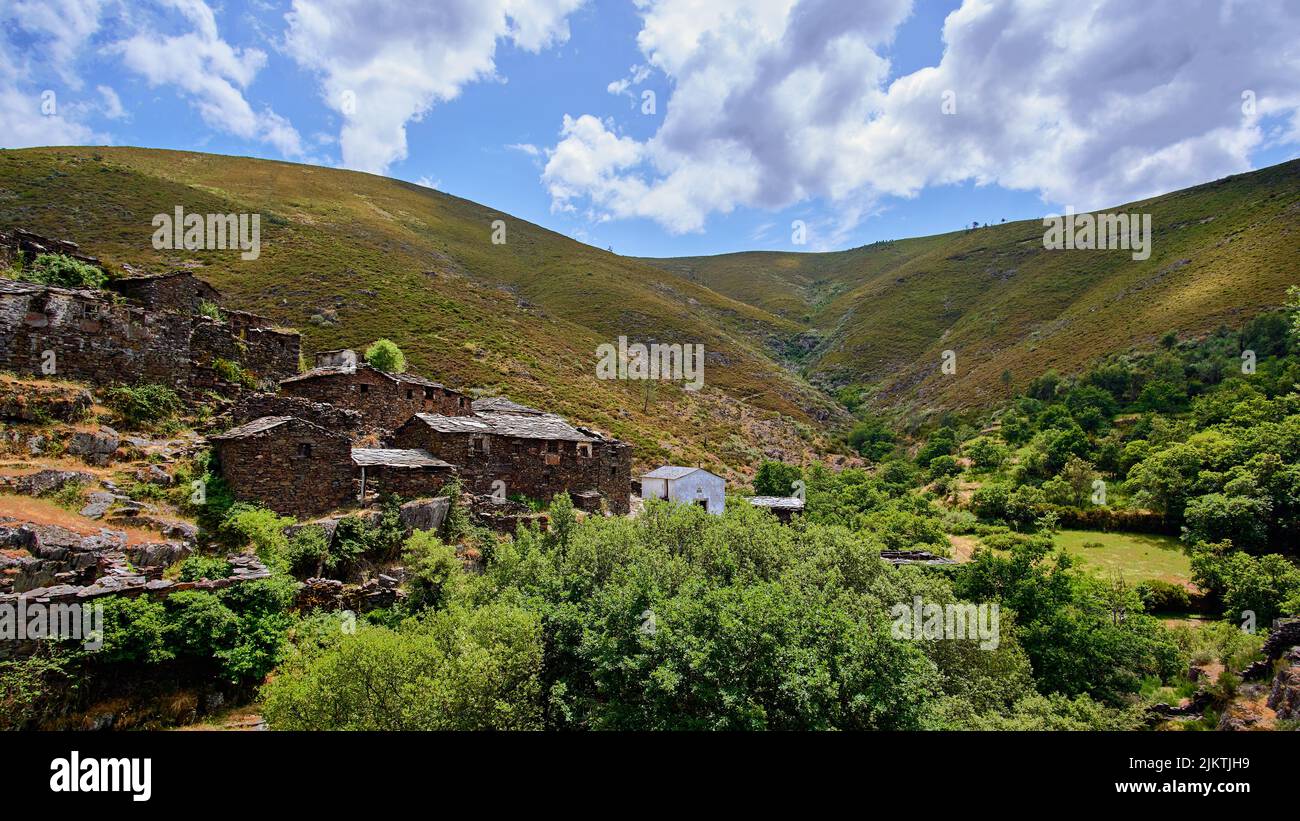 An old village landscape surrounded by mountains and countryside ...