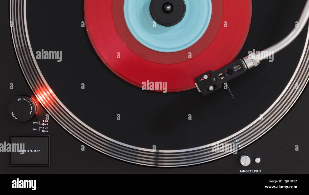 A red single on record player Stock Photo - Alamy