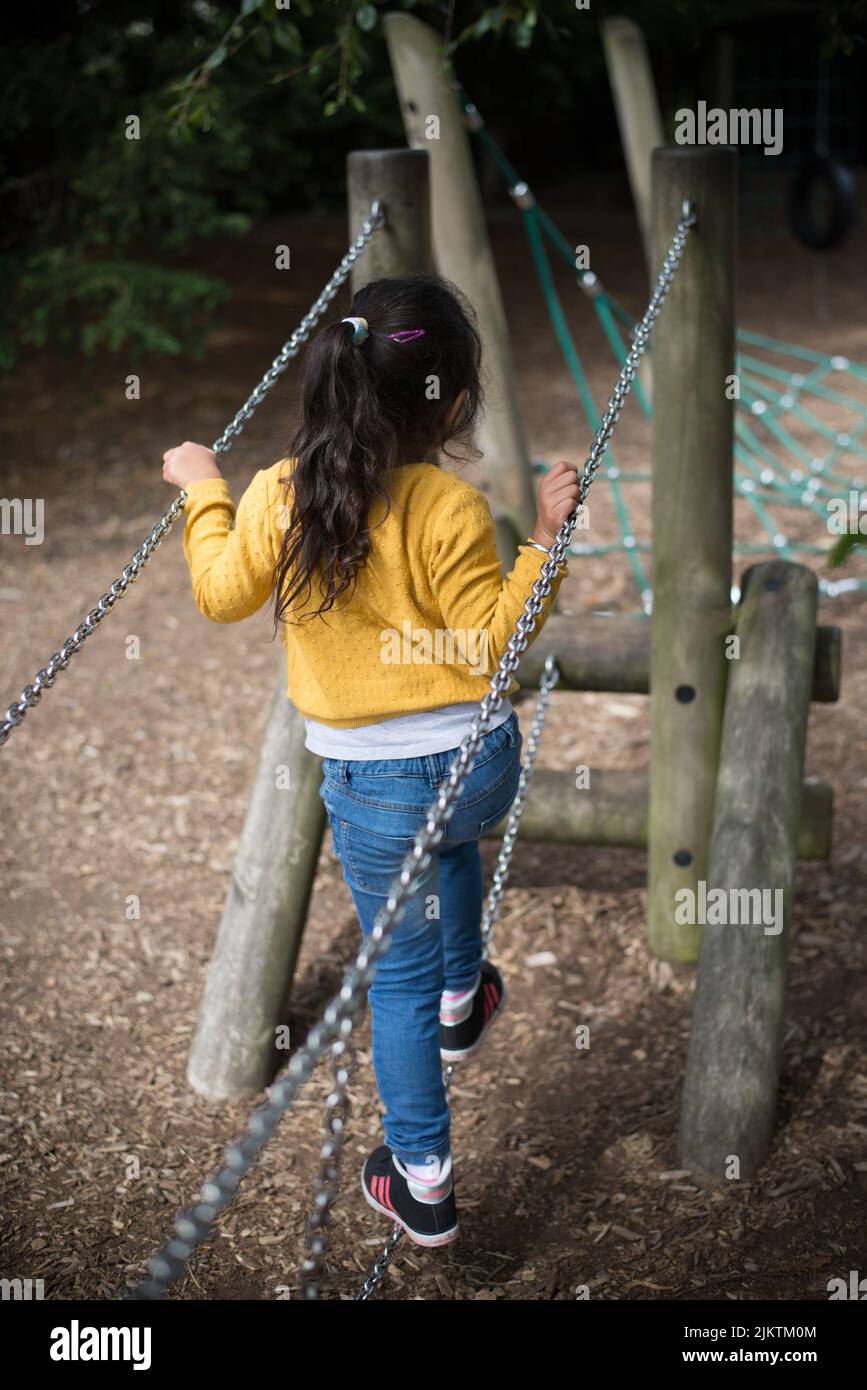 A back view of a baby girl in the park Stock Photo - Alamy