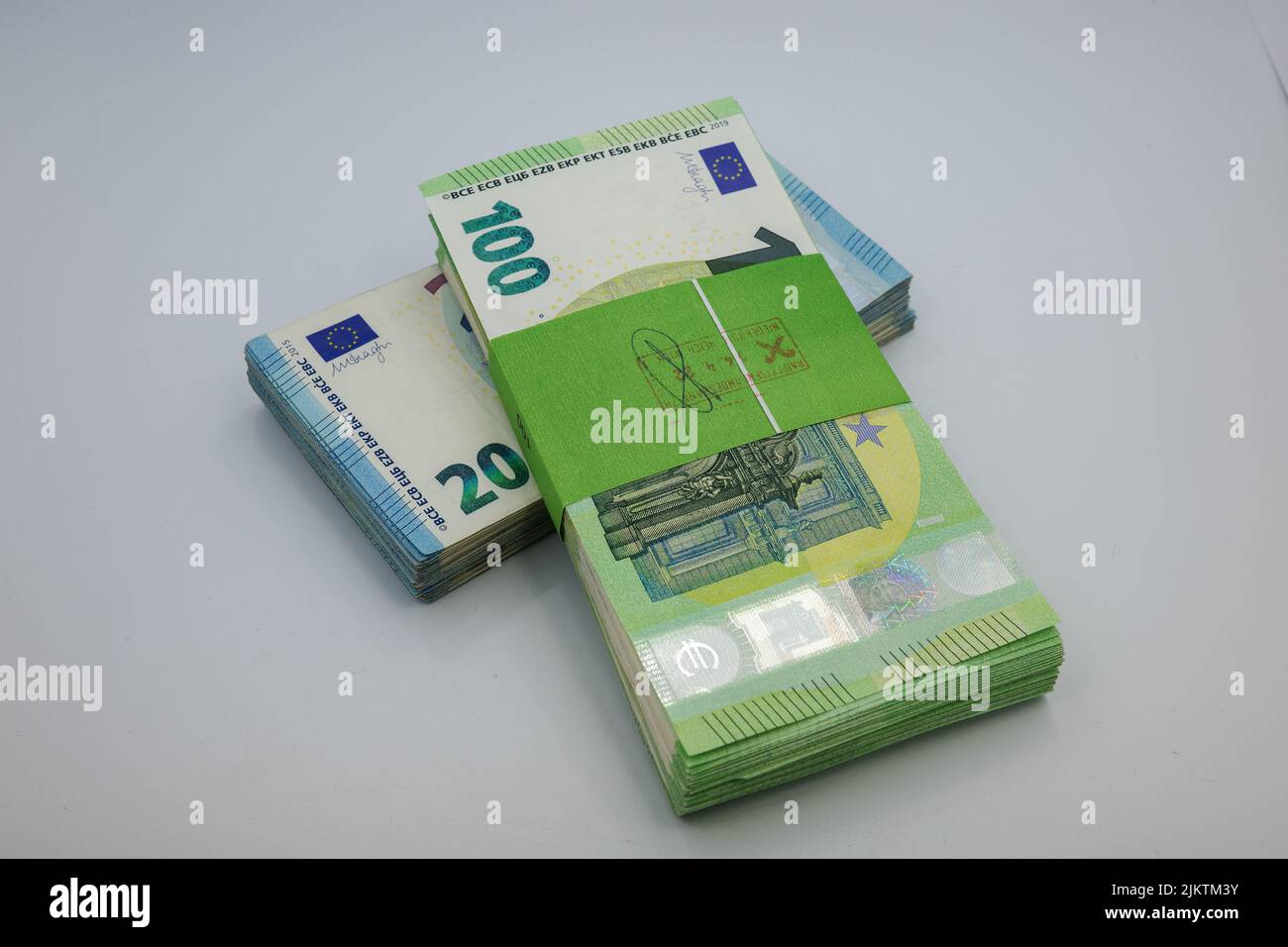 A closeup of stacks of Euro banknotes on top of each other Stock Photo ...