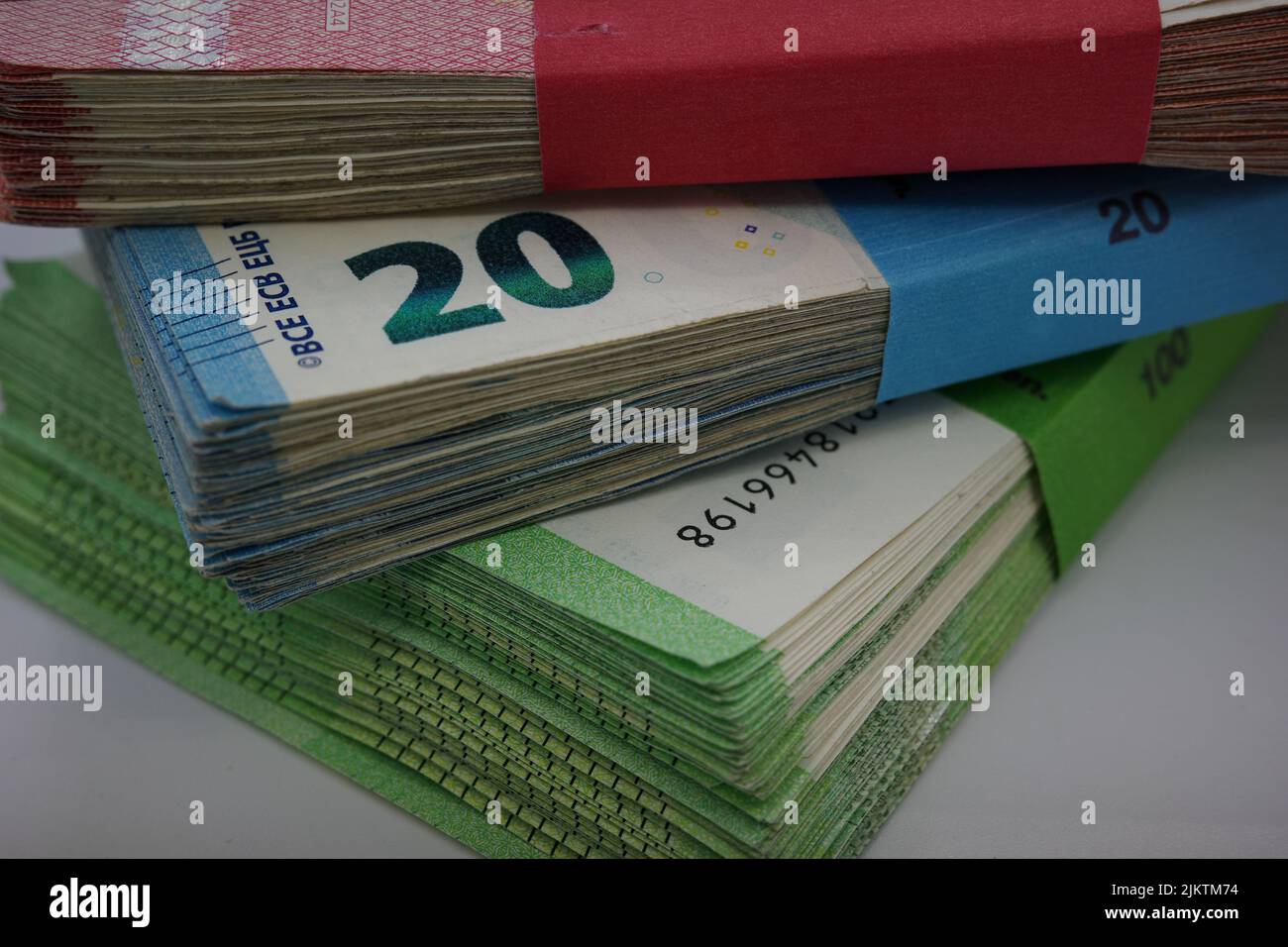A closeup of stacks of Euro banknotes on top of each other Stock Photo ...