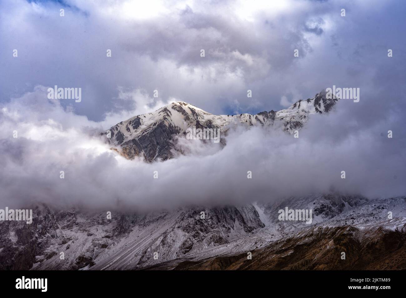 Mountain peak surrounded by clouds hi-res stock photography and images ...