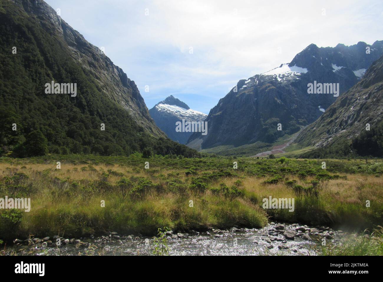 The beautiful view of the mountain range and green vale. New Zealand ...